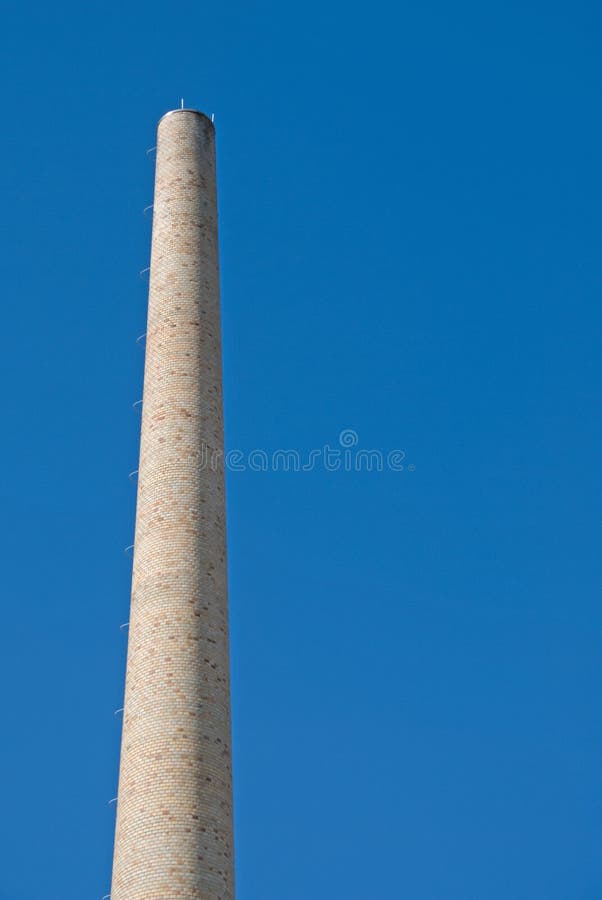 Tall chimney with ladder stock image. Image of concrete - 18894075