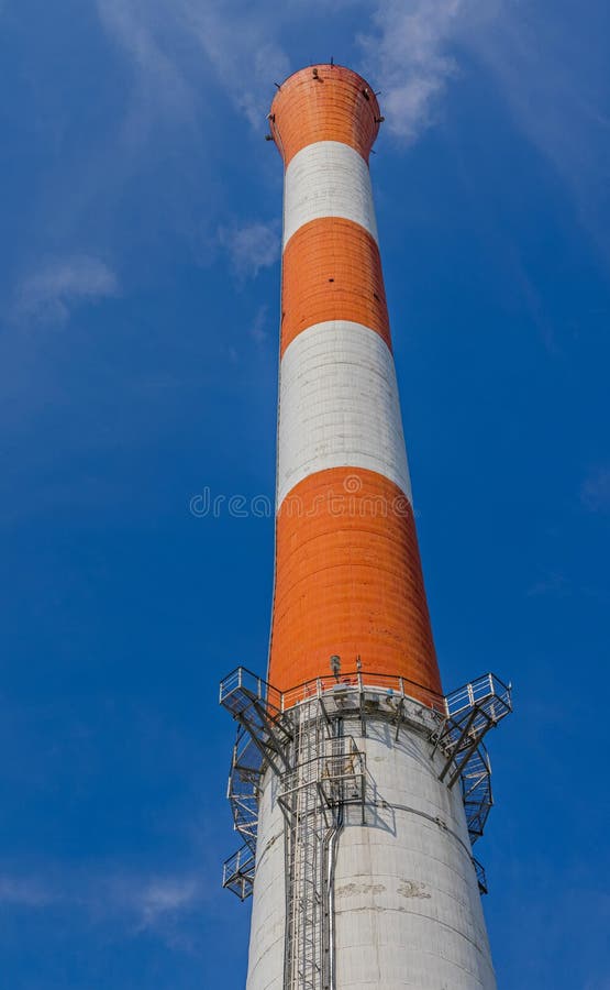 Tall chimney with ladder stock image. Image of concrete - 18894075