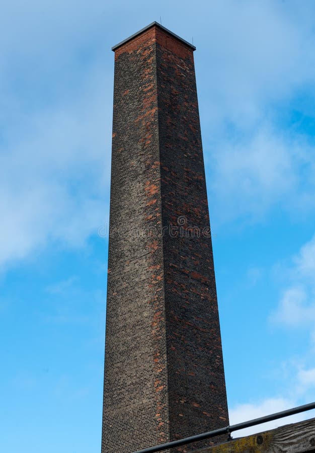 Tall Chimney Stack Against Blue Sky Stock Photo - Image of stack ...