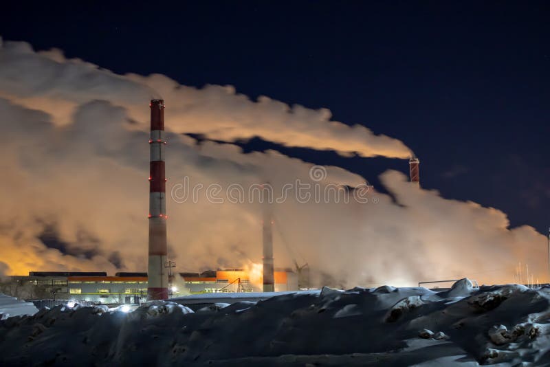 High Chimneys of a Large Factory Stock Photo - Image of blue, exhaust ...