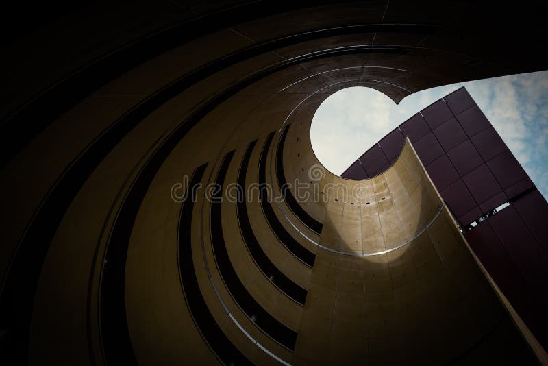 A Tall Circular-shape Building View from the Bottom Stock Photo - Image ...