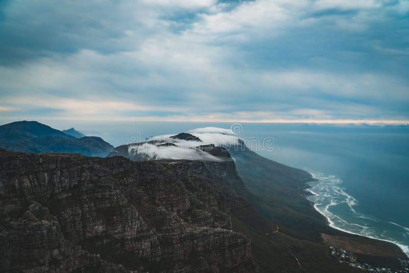Cliffs Near the Ocean Under a Cloudy Sky Stock Image - Image of geology ...
