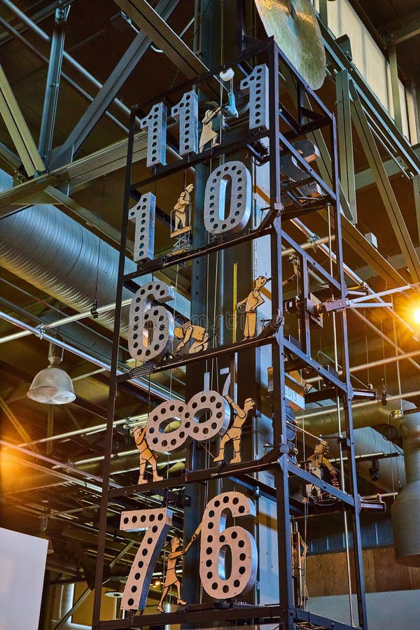 Tall Clock Tower with Mechanical People Moving Numbers Six through ...