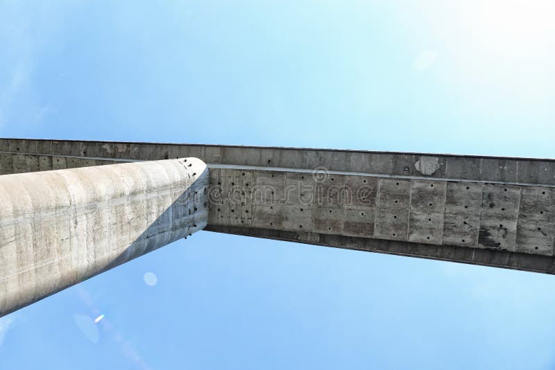 Tall Concrete Bridge Support and Roadway from Behind Stock Photo ...