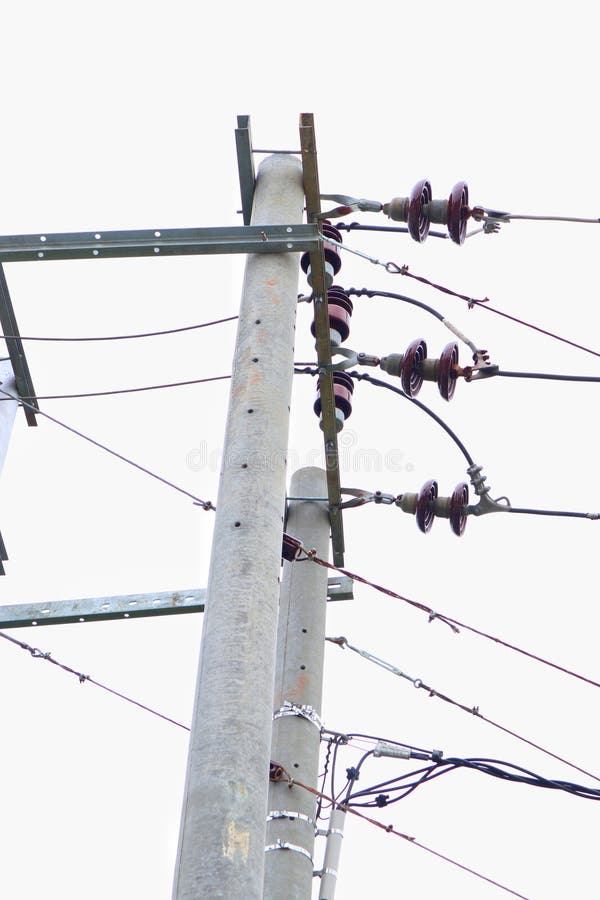 The Electrical Pole is Made of Concrete and Supports Many Wires. Stock ...