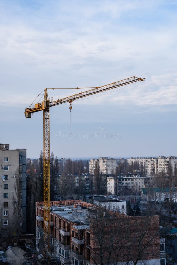 Tall Construction Crane at a Building Site Stock Image - Image of high ...