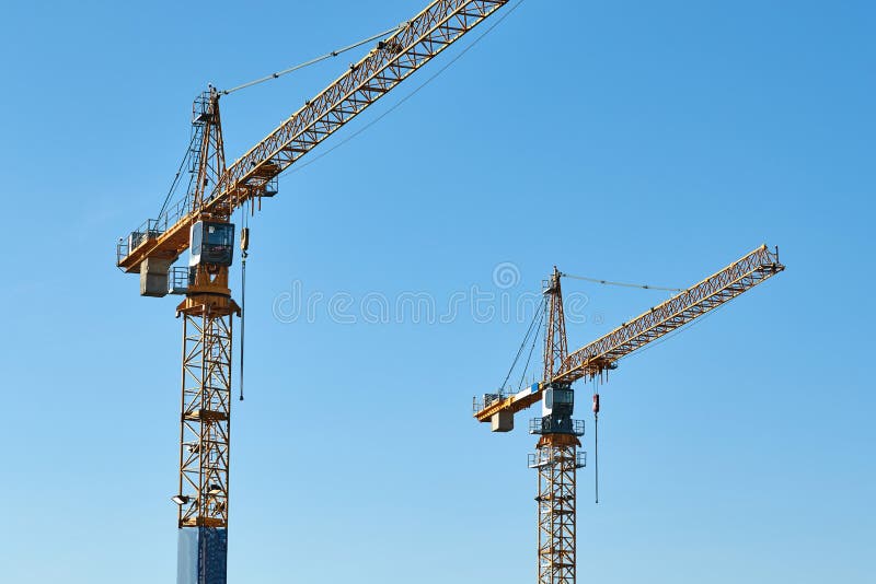 Tall Construction Cranes stock image. Image of high - 183991643
