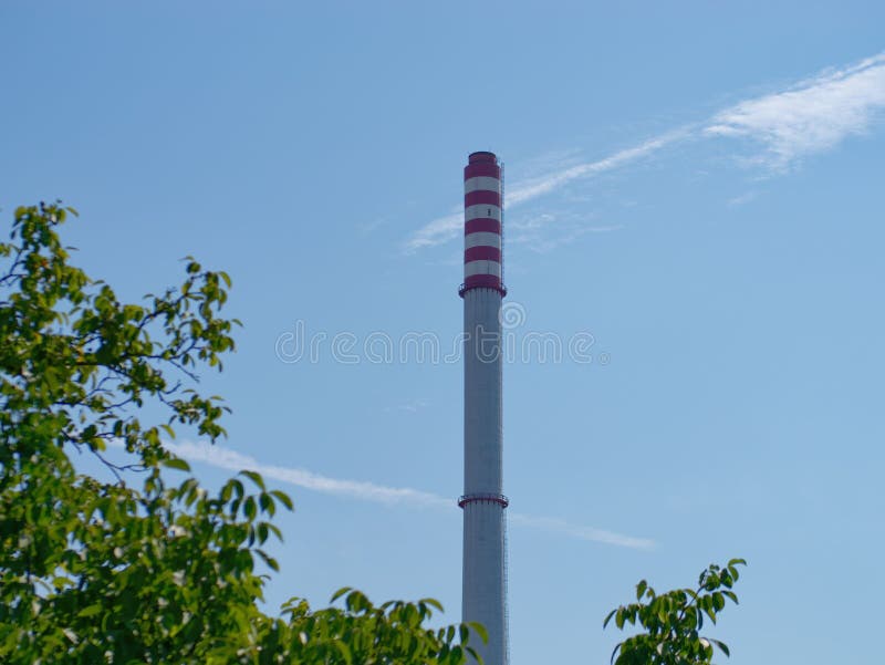 Tall Factory Chimney with a Background of Blue Sky Stock Photo - Image ...