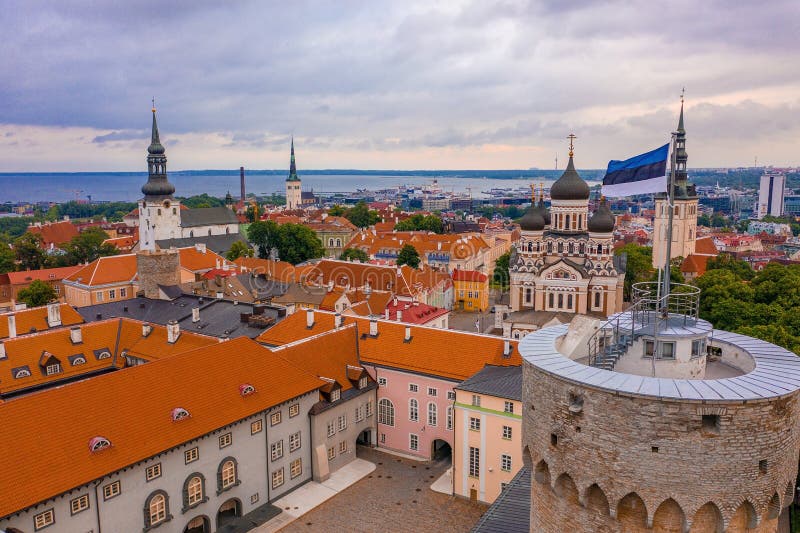 Tall Hermann Surrounded by Buildings and a Cloudy Sky in Tallinn ...
