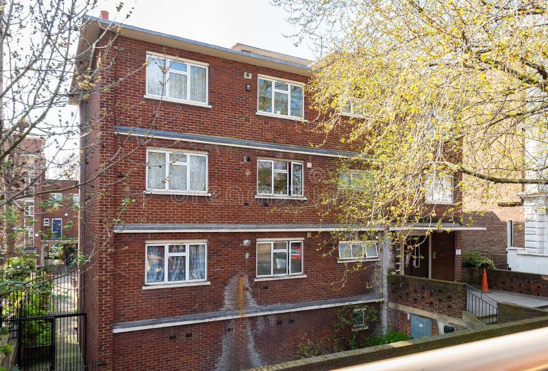 Tall Historic Red Building in London Surrounded by Trees Stock Image ...
