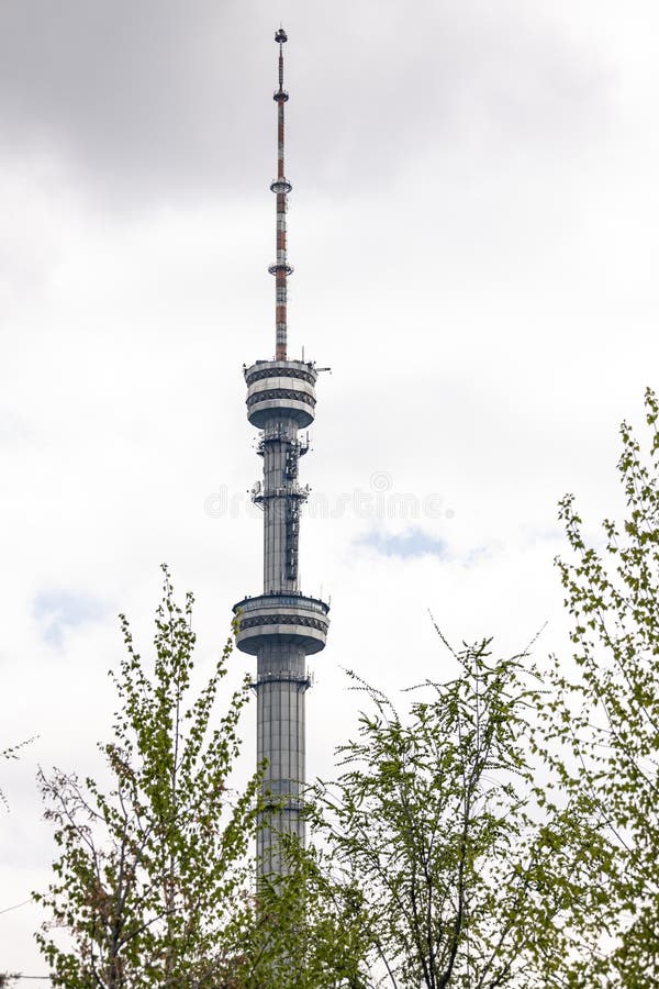 View of the Tv Tower through the Tree Branches. Antenna-mast Structure ...