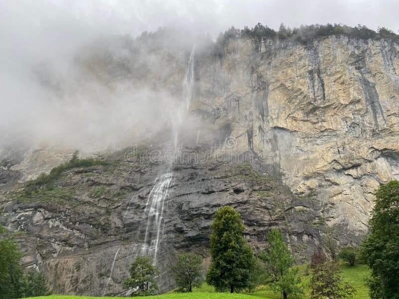 Giant Waterfall from the Clouds Stock Photo - Image of park, rose ...