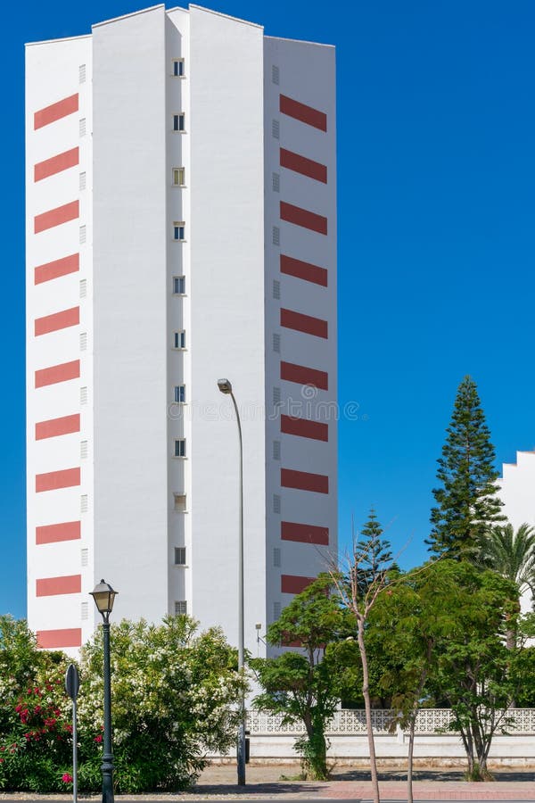 Tall, Lonely Tree-lined Building Stock Photo - Image of vertical ...