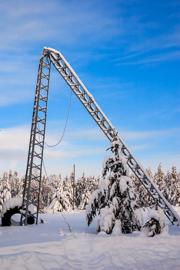 A Tall Metal Structure with a Long Chain Hanging from it Stock Image ...