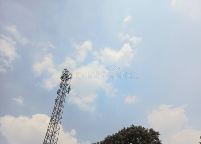 Tall Mobile Network Transmitter Towering Under Clear Sky Stock Photo ...