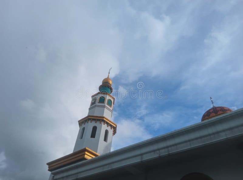The Tall Mosque Tower Looks Bright Blue during the Day Stock Video ...