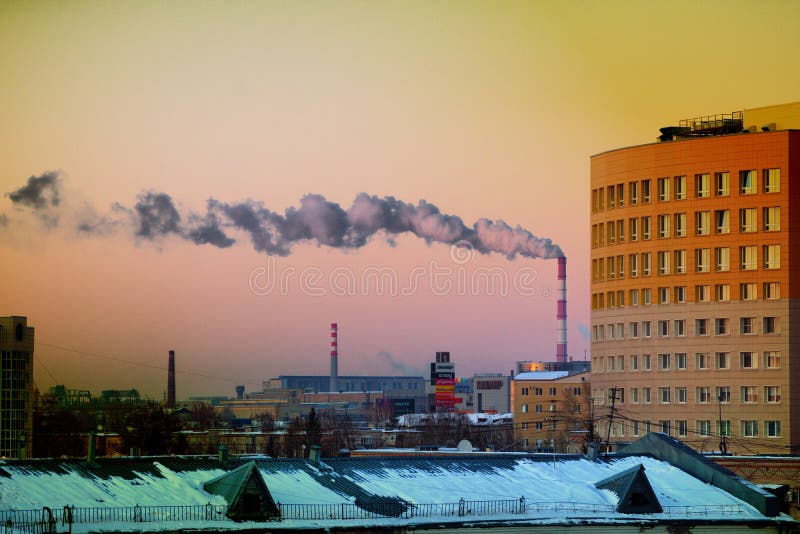 A Tall Multi-storey House Stands in the Rays of the Setting Sun ...
