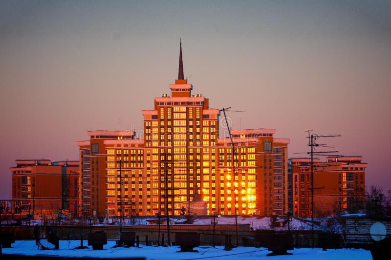 A Tall Multi-storey House Stands in the Rays of the Setting Sun Stock ...