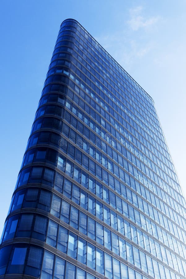 Tall Office Building with Metal Construction and Windows Reflecting the ...