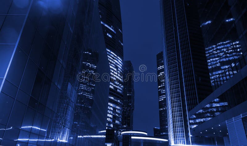 Tall Office Buildings by Night. Concept in Blue Tone Stock Image ...