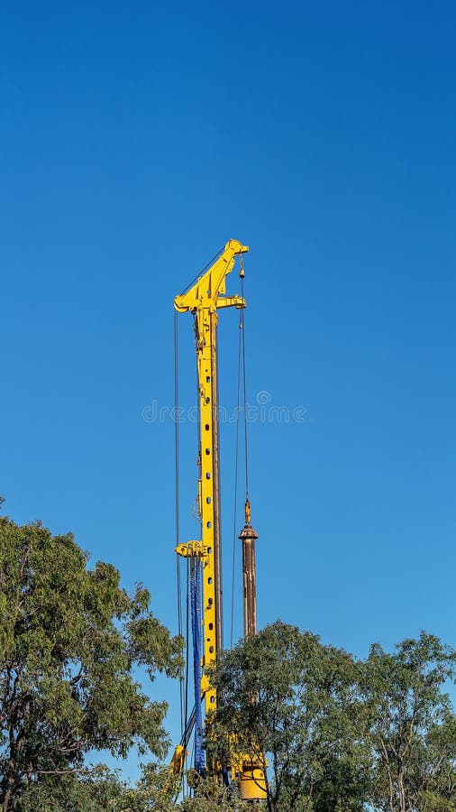 Tall Pile Driver Machinery To Construct Bridge Foundations Stock Image ...