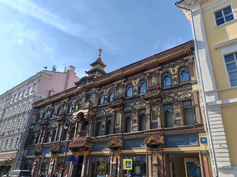 Tall Pink Residential Building with Classical Decorative Elements ...
