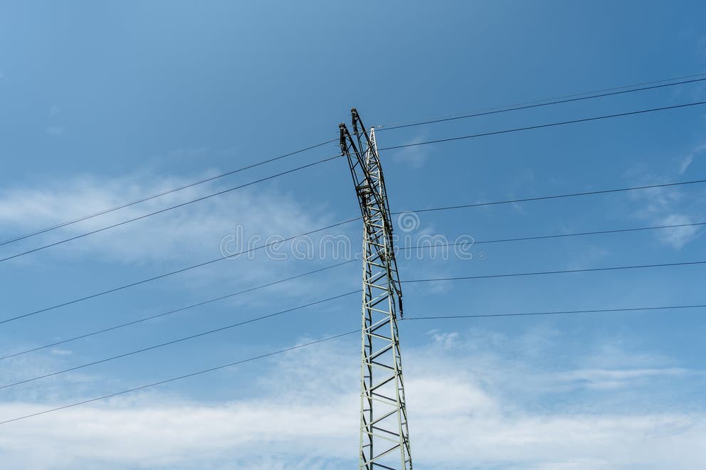 A Tall Power Pole with Wires Running from it Stock Image - Image of ...