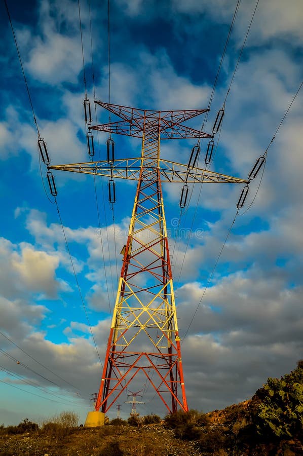 A Tall Power Tower with a Red and White Base Stock Photo - Image of ...