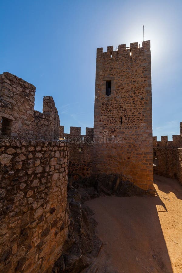 A Tall, Rectangular Stone Tower Rises Prominently within the Fortress ...