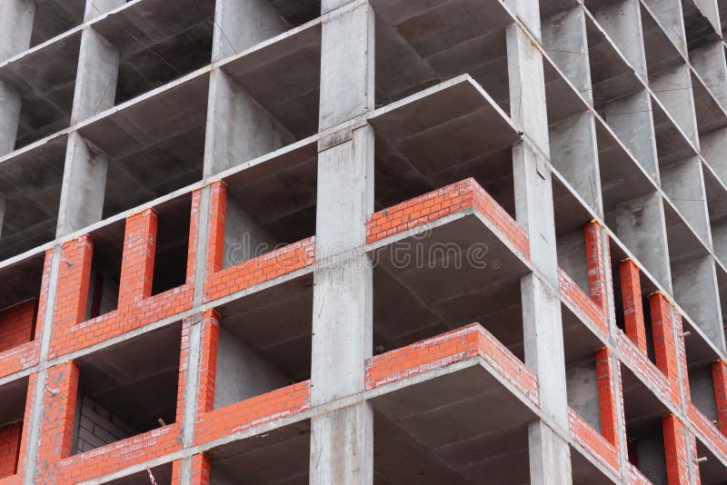 A Tall Residential Building Under Construction. Orange Bricks on the ...