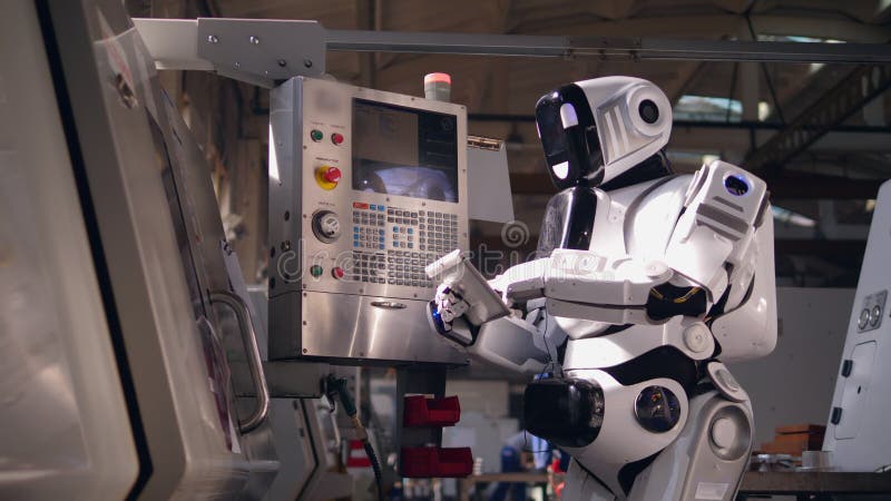 Tall Robot is Operating a Tablet and an Industrial Console Stock ...