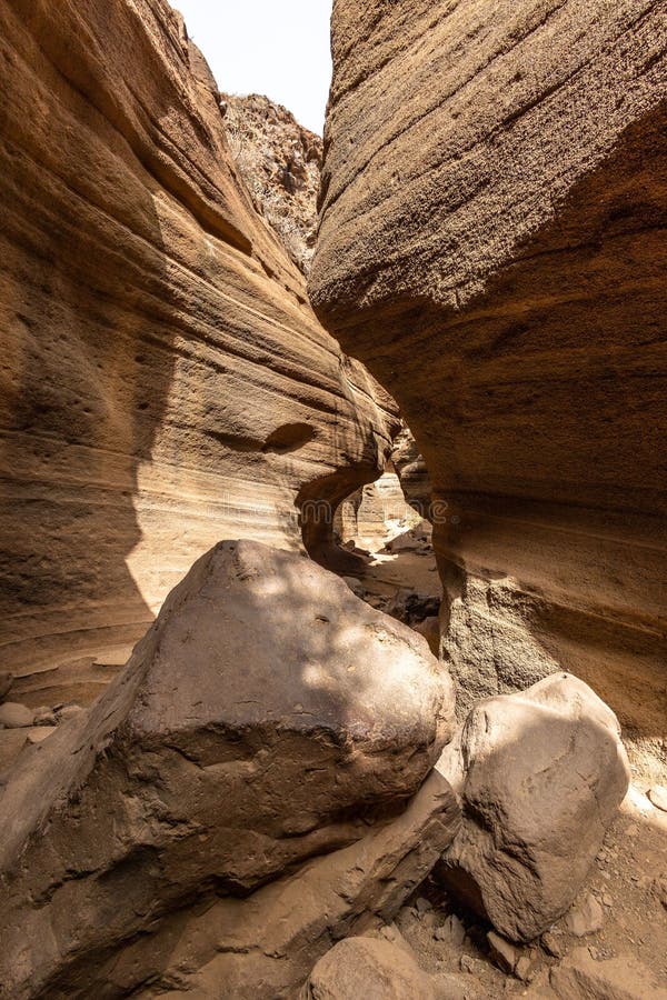 Rocky cliffs in a desert stock photo. Image of stone - 257723756