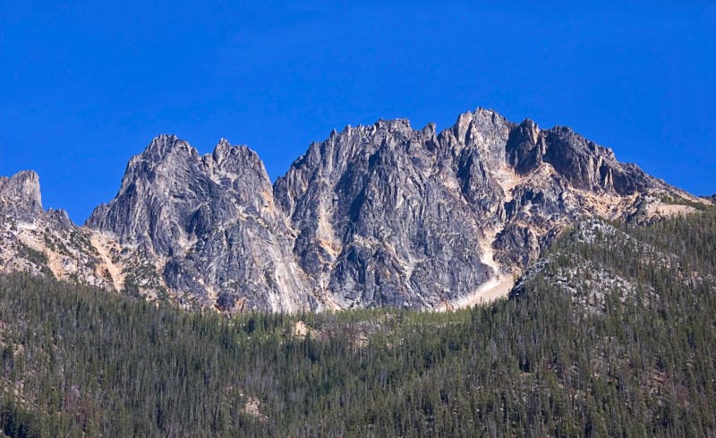 Tall Rugged Mountain stock photo. Image of daylight, woods - 11057632