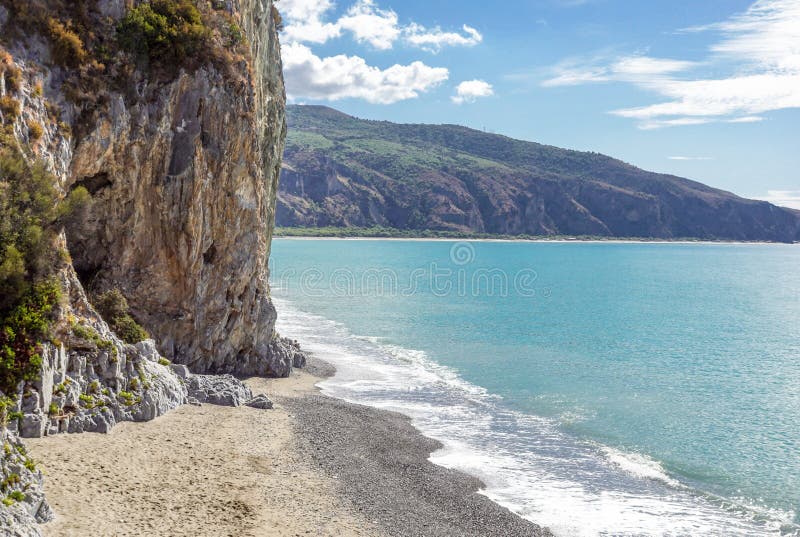 Tall Sharp Cliff Shooted from the Water on the Beach Stock Photo ...