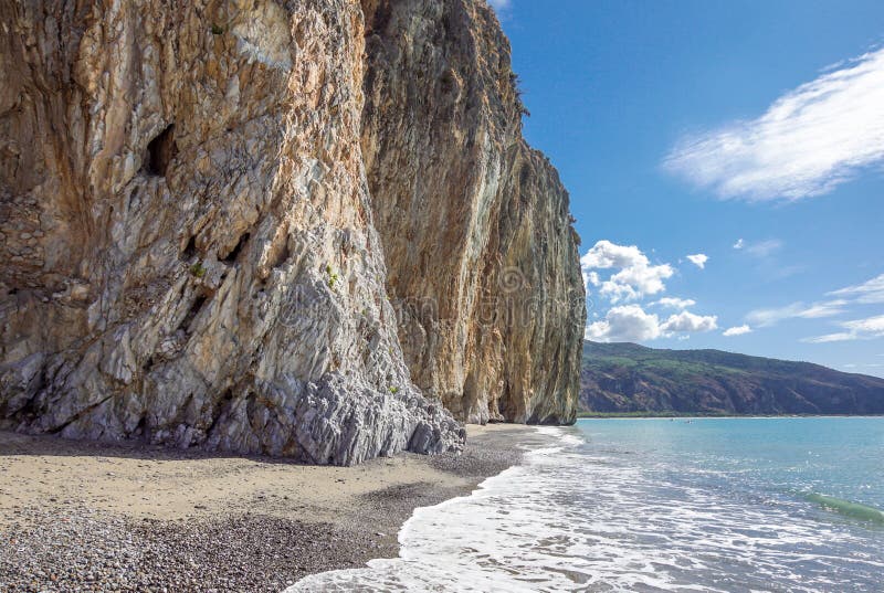 Tall Sharp Cliff Shooted from the Water on the Beach Stock Photo ...