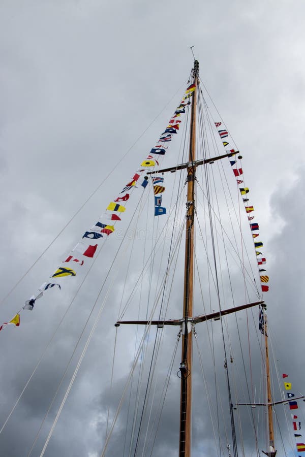 Signal Flags on the Mast of a Tall Ship Stock Image - Image of cloudy ...