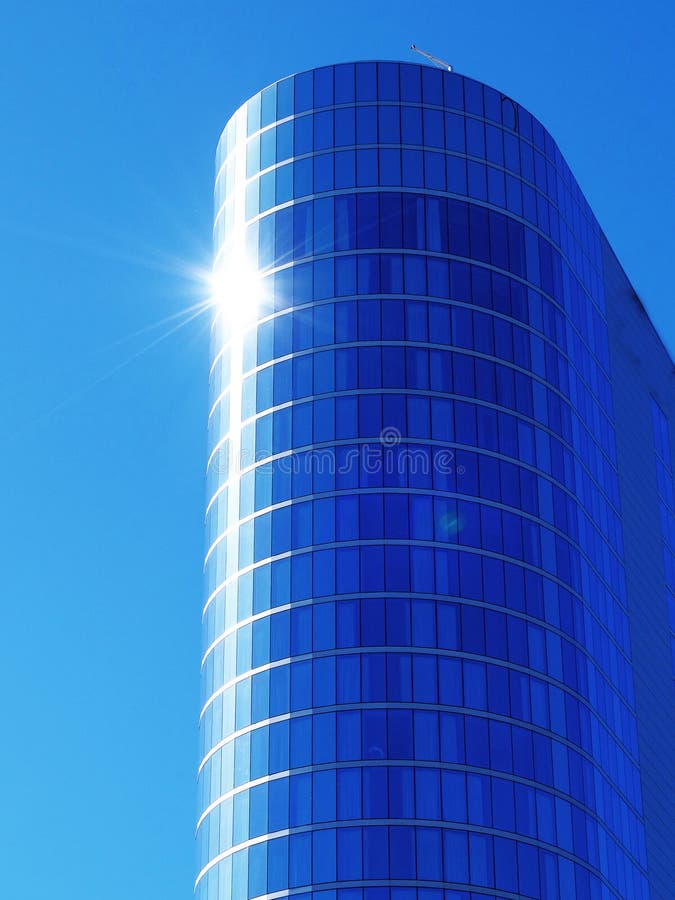 Tall Sky Scraper Business Building with Blue Sky and Sunstar Sun Star ...