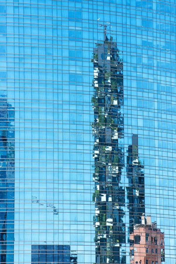 Tall Skyscraper Reflected in a Glass Facade Stock Photo - Image of ...