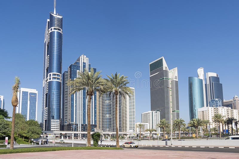 Tall Skyscrapers Against the Blue Sky. Dubai Editorial Image - Image of ...