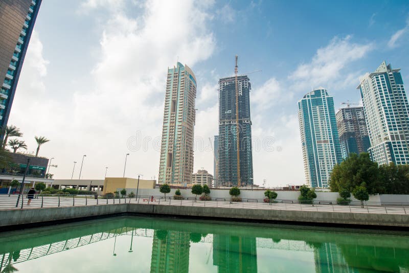 The Tall Skyscrapers in Dubai Near Water Editorial Stock Image - Image ...