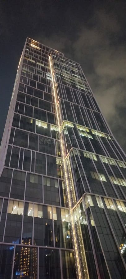 Tall Skyscrapers Towering Towards the Night Sky Stock Image - Image of ...