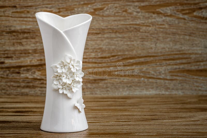 Tall and Slim Decorative White Vase with Detailed Artwork Stock Photo ...