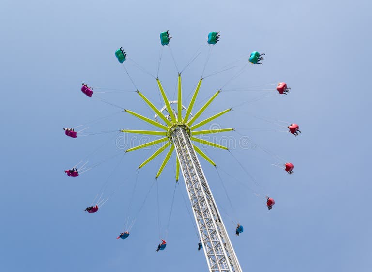Tall Spinning Chair Carousel Editorial Stock Image - Image of spinning ...