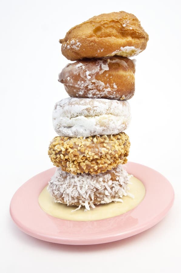 Stack of Donuts on a Pink Plate Stock Image - Image of fashioned, donut ...