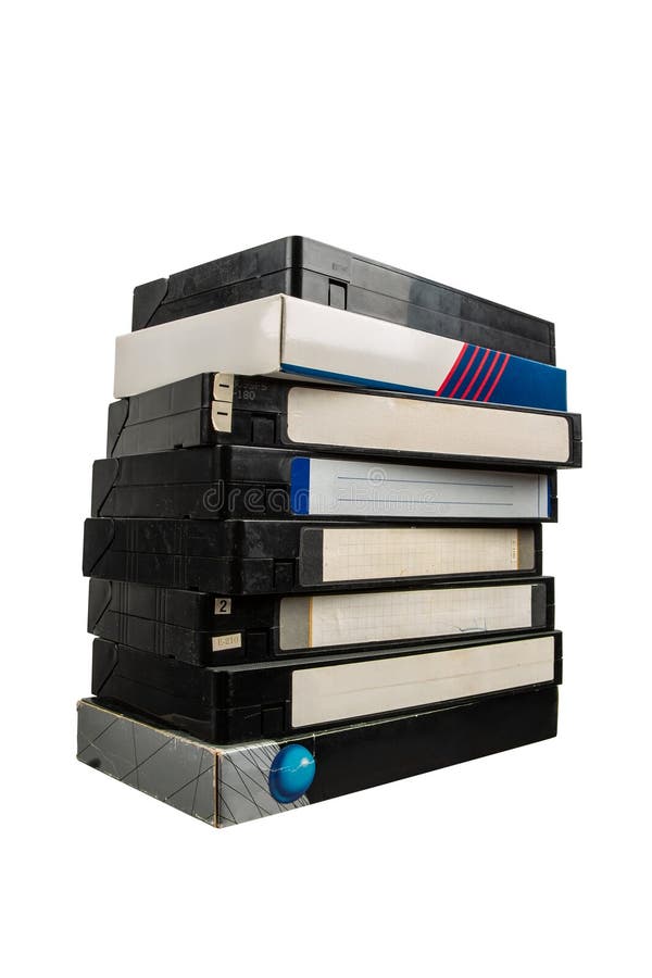 A Tall Stack of Old VHS Video Tapes with Worn Labels and Cases ...