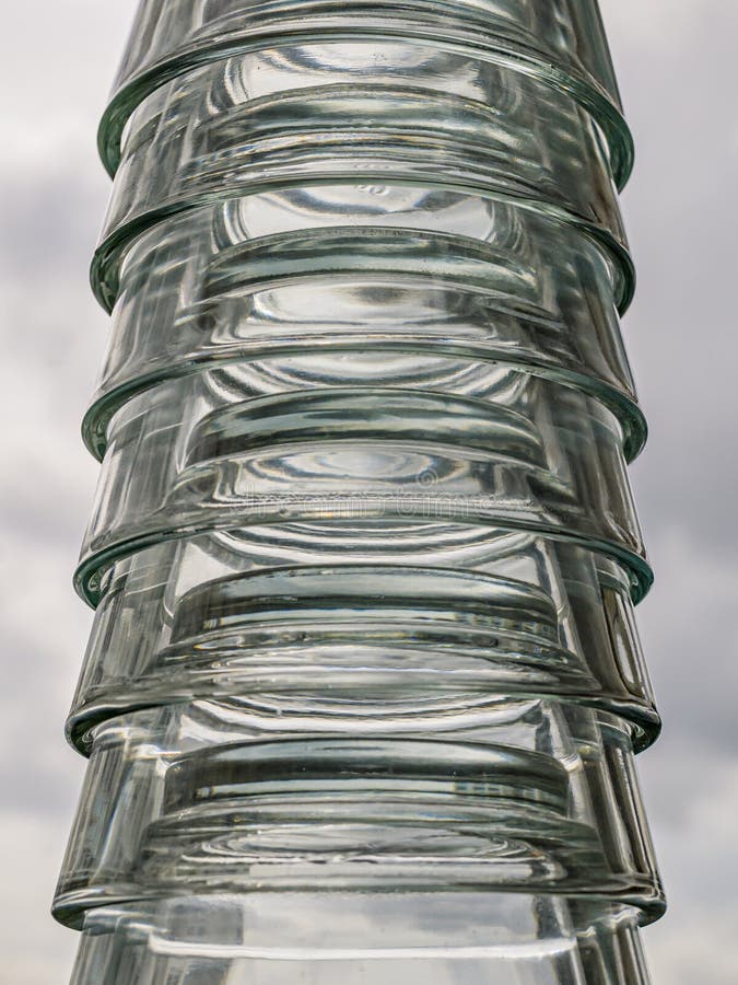 A Tall Stack of Small Glass Cups by the Window. Stock Photo - Image of ...