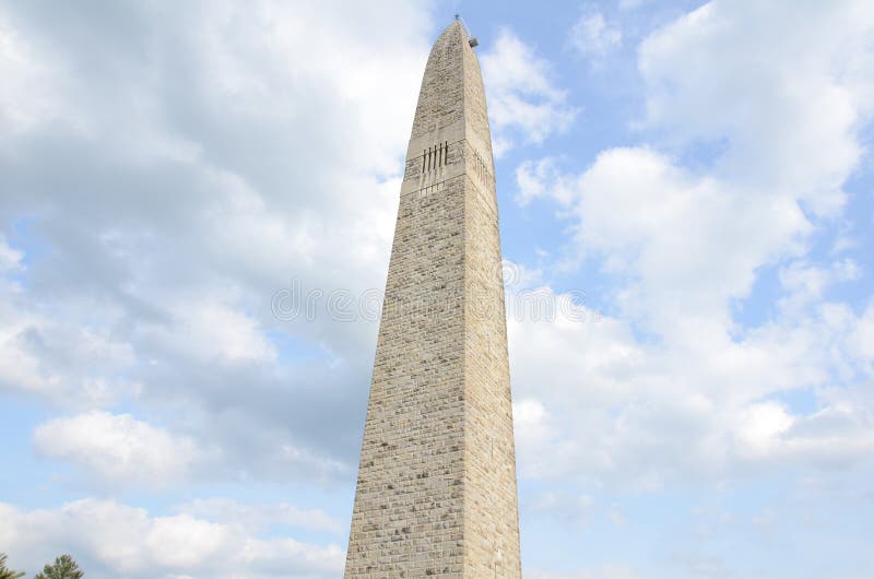 Tall Stone Building or Tower with Clouds in Sky Stock Photo - Image of ...