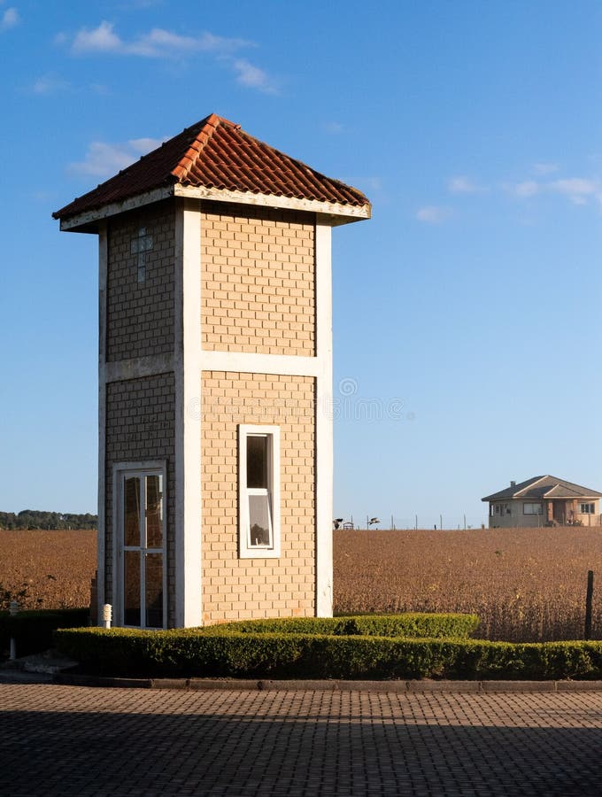 A Tall Stone Building Under Clear Blue Sky Stock Image - Image of ...