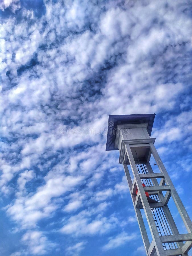 Tall Water Tank Tower with Cloudy Blue Sky Backgound Stock Photo ...