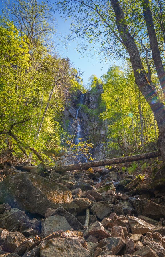Tall Waterfall with Low Flow and Partially Dry Stream Stock Photo ...